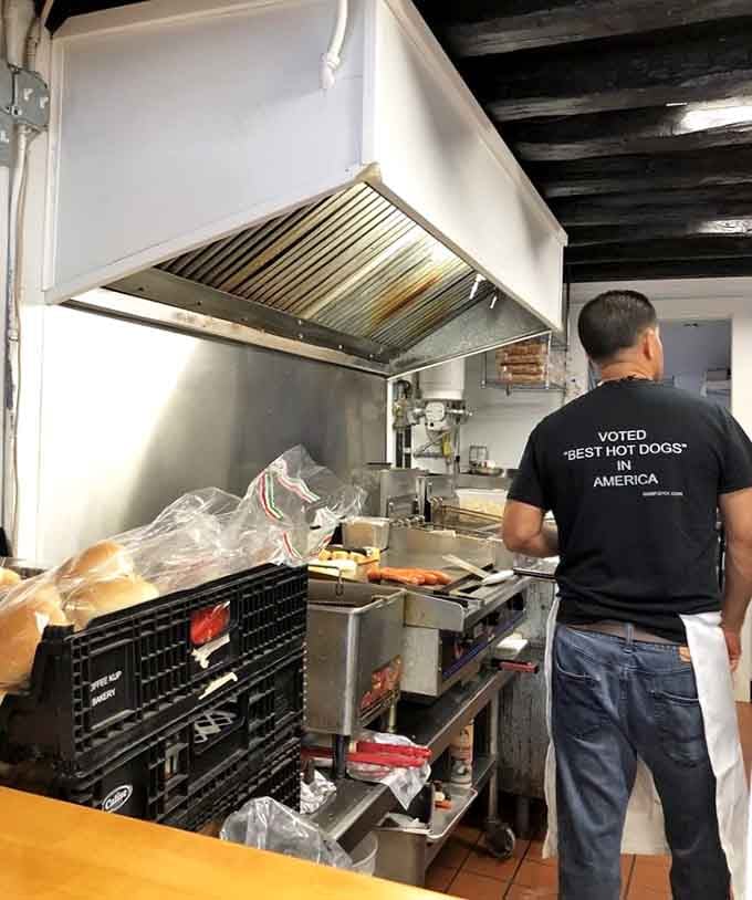 Behind every great hot dog is someone who's perfected the craft through years of dedication and countless satisfied customers.