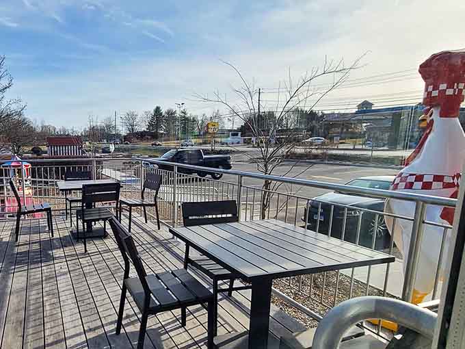 That outdoor deck with umbrellas is where summer evenings and great food create memories worth keeping.