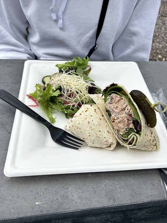 Wraps stuffed with chicken salad and topped with shredded cheese prove lighter options still get the artisan treatment here.