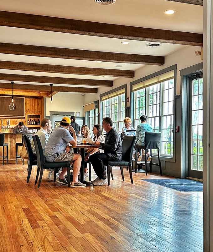 Diners enjoying their meals in the bright, welcoming space that encourages lingering over good food.
