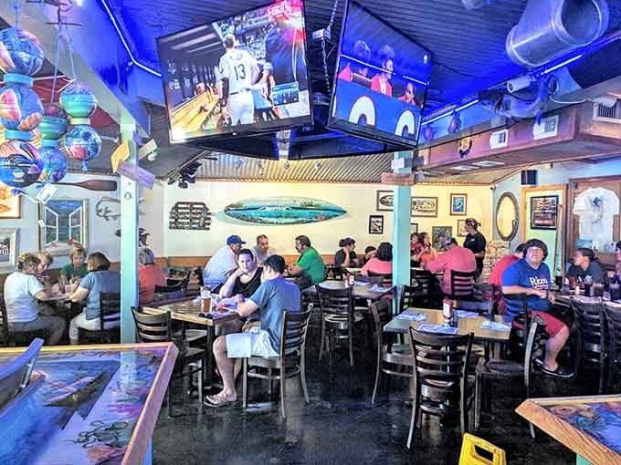 Happy customers enjoy their meals, proving this casual spot attracts locals and visitors who know good food.