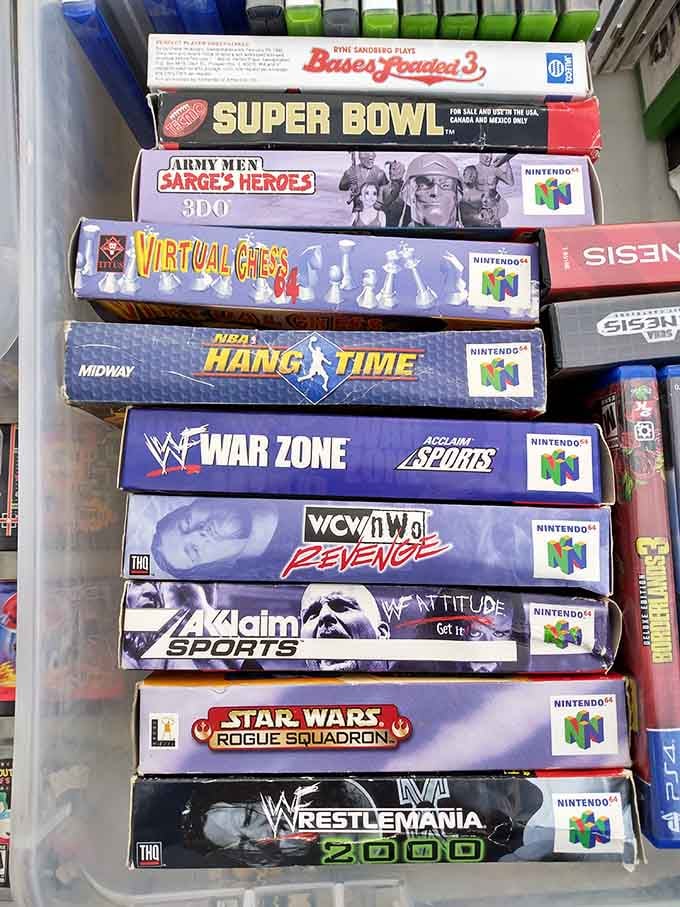 Nintendo 64 games stacked like memories, reminding us when WrestleMania 2000 was cutting-edge entertainment technology.