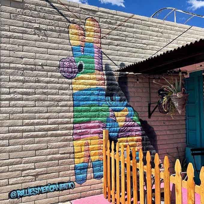 Vibrant street art featuring a guitar adds that authentic Tucson flavor and makes every visit feel special.