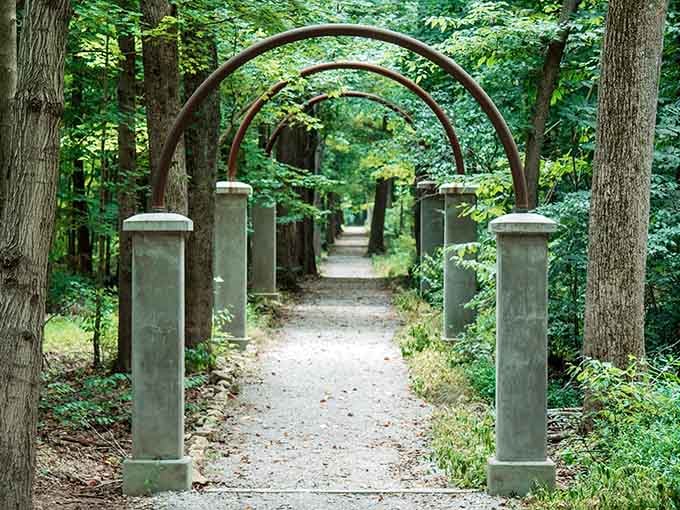 Multiple archways create a tunnel through time, each one framing another chapter of this forgotten story.