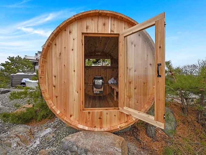 A barrel sauna perched on the hilltop, because regular relaxation apparently wasn't quite relaxing enough for this place.