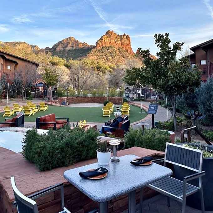 Outdoor seating where umbrellas provide shade and Mother Nature provides the entertainment. Fair trade, honestly.