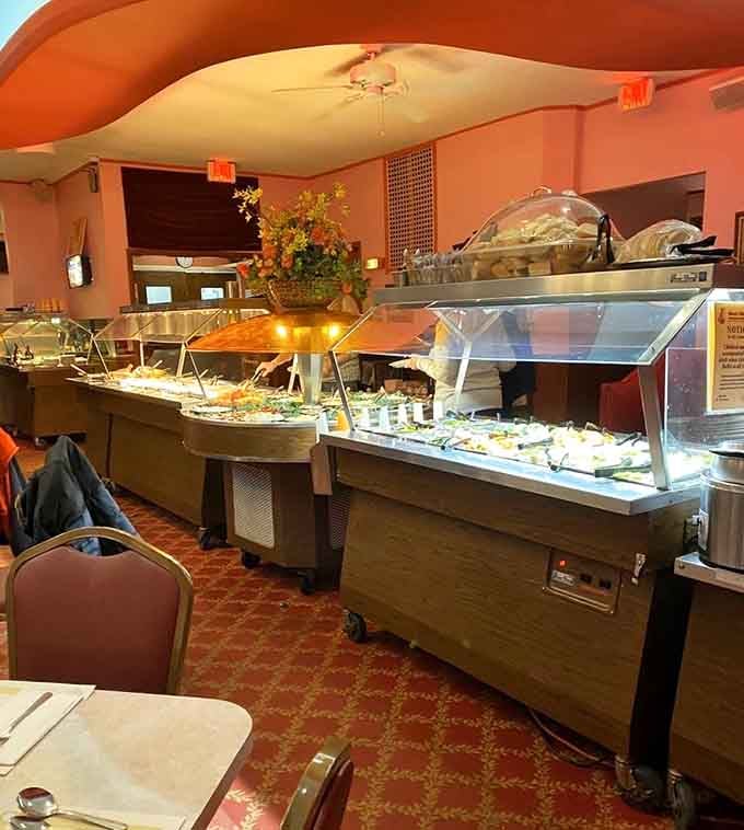 The buffet station stretches invitingly, offering hot trays of Polish specialties that'll make decision-making delightfully impossible for you.