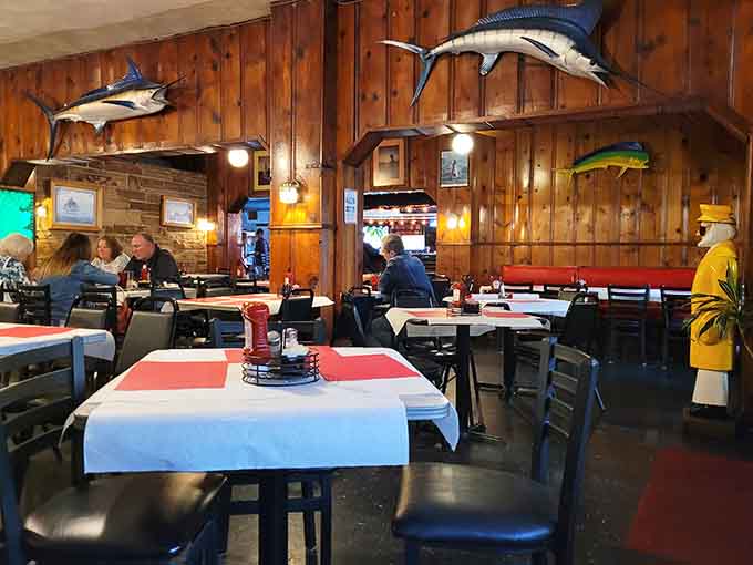 Another angle reveals more maritime treasures adorning walls that have witnessed countless celebrations and conversations.