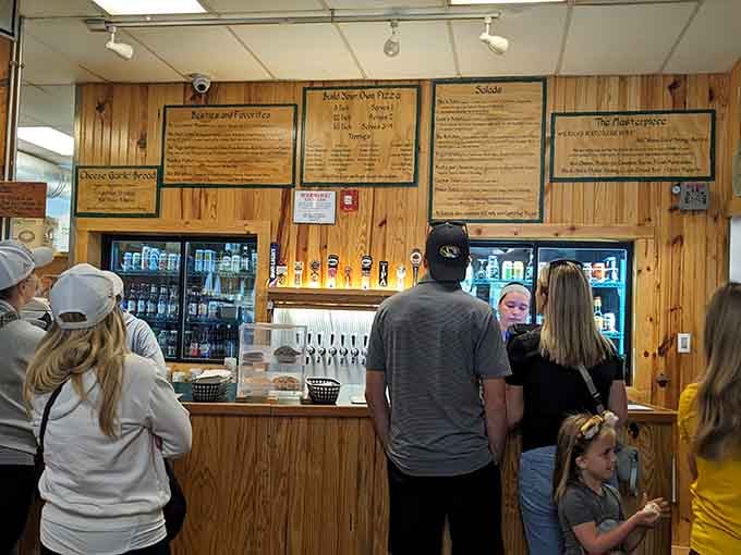 The line moves fast, but nobody minds waiting when they know what's coming on that plate.