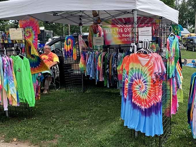 Tie-dye shirts bringing groovy vibes to a market where vintage meets the eternal spirit of summer festivals.