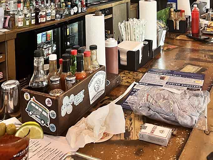 Hot sauce, paper towels, and condiments stand ready for whatever messy deliciousness you've ordered.