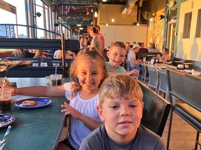 Happy kids enjoying their meal &ndash; the ultimate restaurant review that no food critic can ever truly replicate or fake.