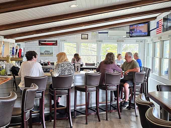 Happy diners enjoying their meals in a space that understands comfort matters as much as the food.