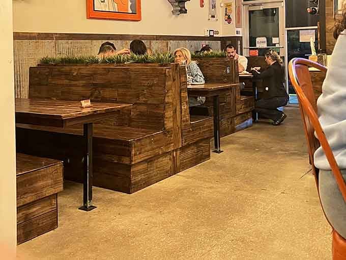 Booth seating with wooden dividers means you can enjoy your meat-induced food coma in semi-private comfort.