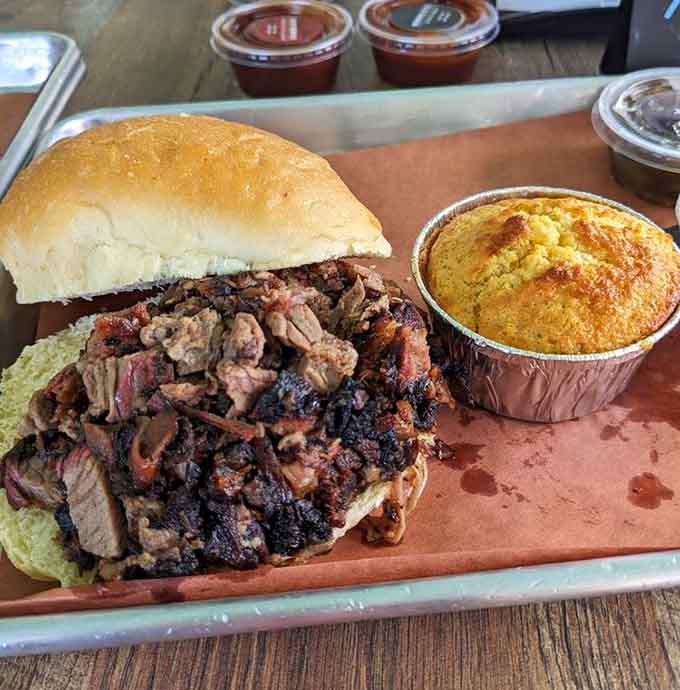 That chopped brisket sandwich with golden cornbread could make Fred Flintstone weep tears of prehistoric joy and longing.