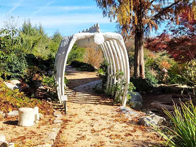 This whimsical garden arch frames the path ahead, making every walk feel like entering a secret garden.