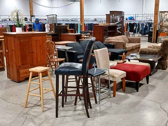 Mismatched chairs and stools gathered like guests at the world's most eclectic dinner party, each with its own story.
