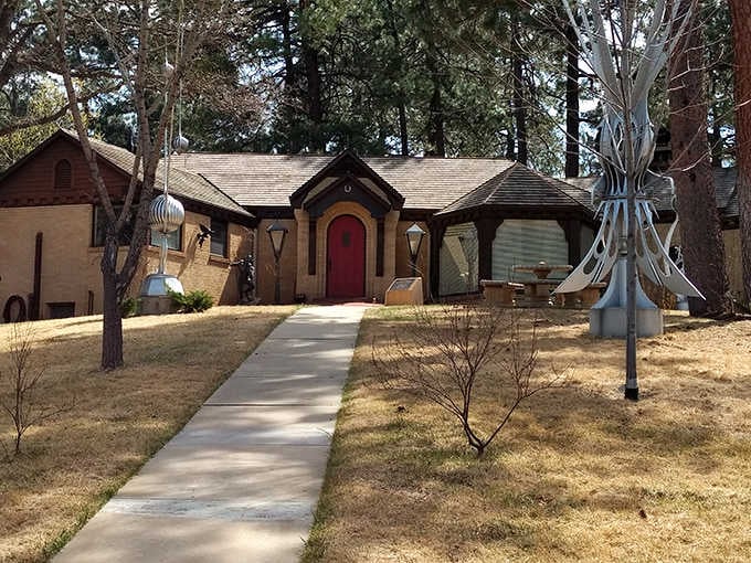 Even the charming house takes a backseat to these towering sculptures that turn suburban living into an art lover's paradise.