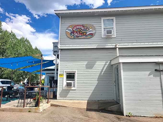 The Back Door Grill promises casual dining where ski boots are acceptable footwear and nobody judges.