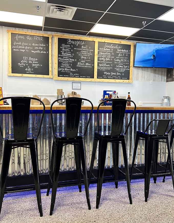 Counter seating with a view of those tempting menu boards, perfect for solo diners or quick lunch breaks.
