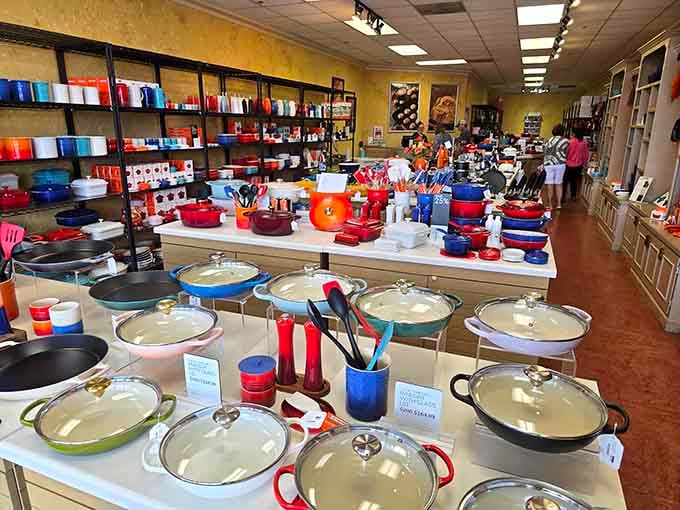 Le Creuset's rainbow of cookware promising culinary excellence, or at least making your kitchen look like you know what you're doing.