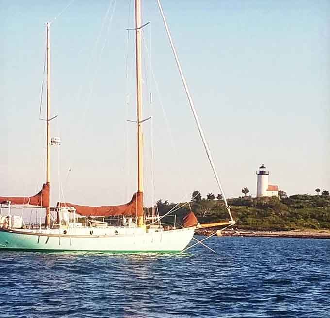 Classic sailboats anchoring in the cove create scenes that could be from any decade since 1817.