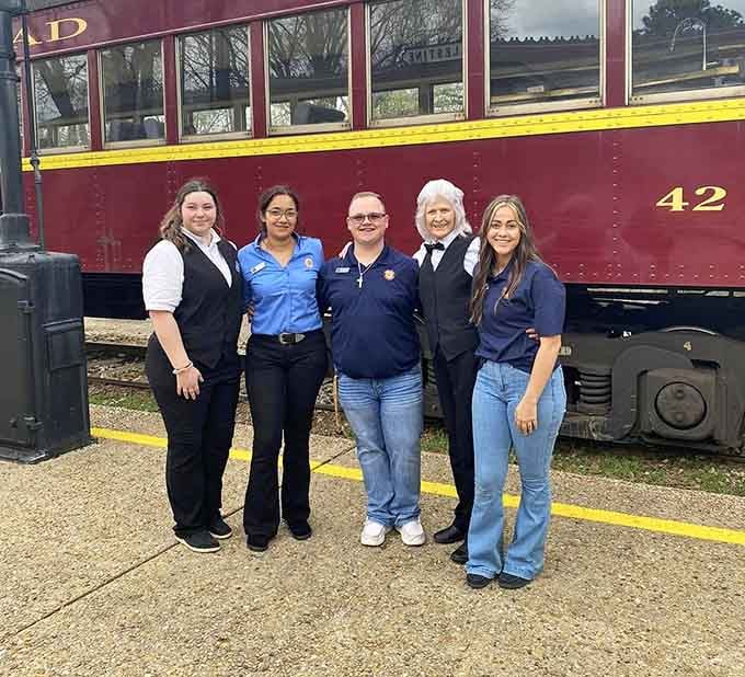 The dedicated staff keeps this railroad running smoothly, their smiles as genuine as their passion for preserving history.