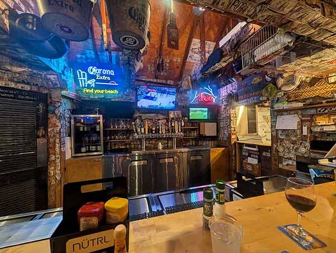 The bar area covered in vintage signs and fishing memorabilia feels more genuine than most restaurants trying too hard nowadays.