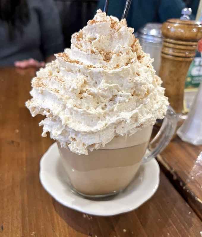 Vienna coffee topped with whipped cream mountain peaks that would make any Austrian grandmother proud indeed.