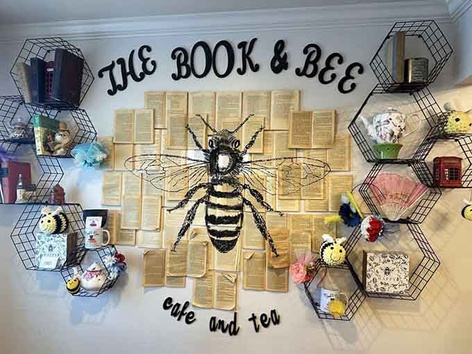 That bee artwork and honeycomb shelving tie the whole literary theme together with unexpected whimsical charm throughout.