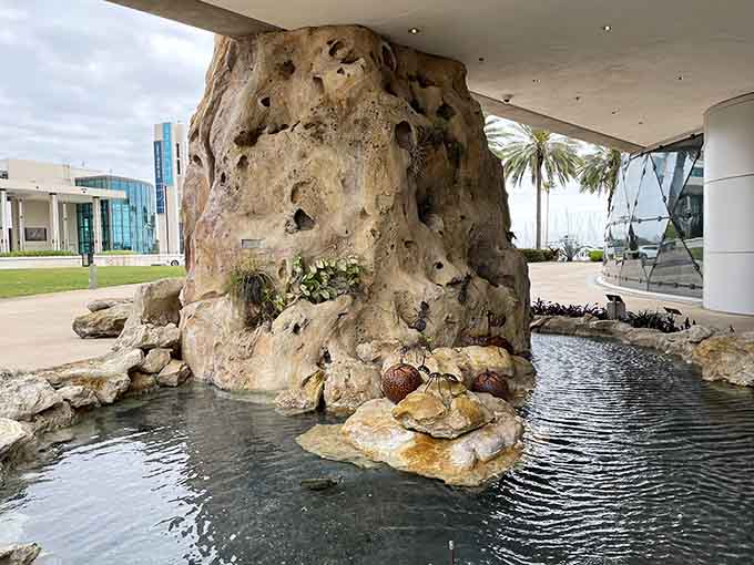 This porous rock formation outside the museum sets the tone for the wonderfully strange journey ahead.