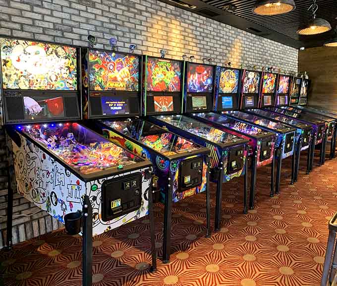 Pinball machines lined up like soldiers of fun, ready to transport you back to better, simpler times.