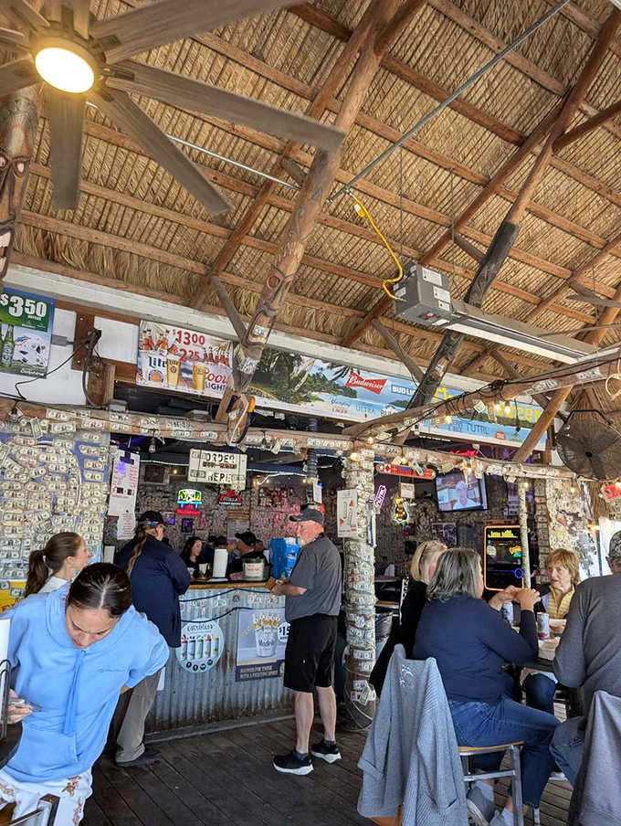 Order at the thatched-roof counter where efficiency meets island vibes and everyone knows exactly what they want.