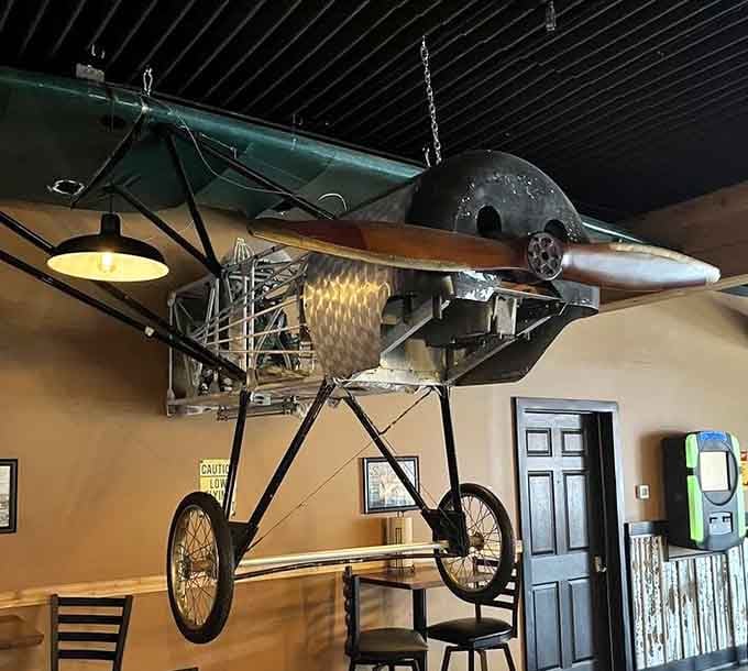 A full-size vintage aircraft suspended from the ceiling proves this place doesn't do anything halfway or half-heartedly.