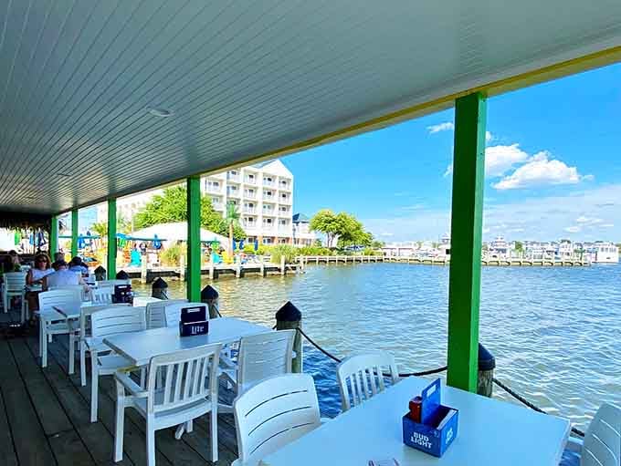 White chairs lined up facing the narrows, offering front-row seats to the greatest show on water: boats and nature.