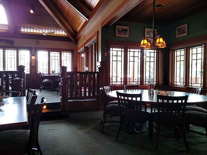 Craftsman-style woodwork and cozy booths create intimate spaces perfect for lingering over dinner and drinks together.