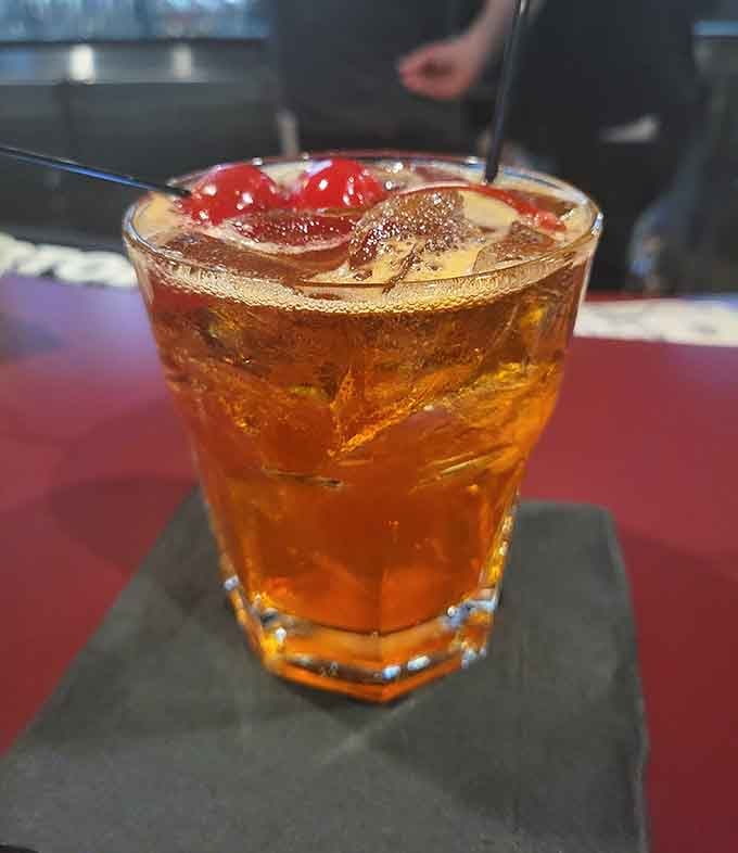 A perfectly crafted old fashioned with a cherry on top, because Wisconsin knows how to treat its cocktails with proper respect and care.