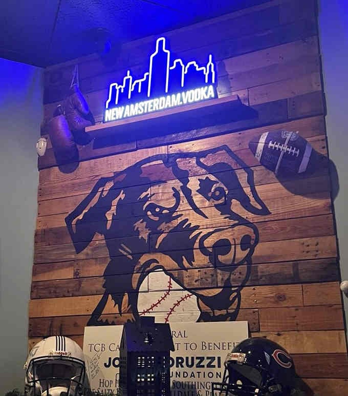 The glowing neon dog logo against reclaimed wood captures the playful spirit of this beloved Milldale destination.