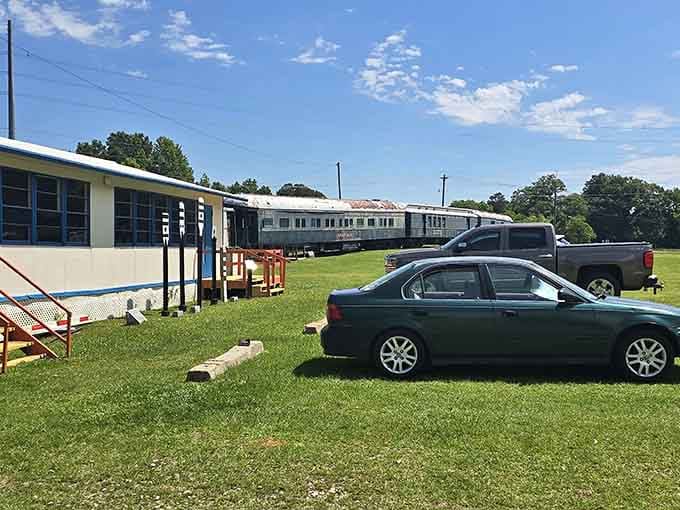 The museum grounds welcome visitors with vintage passenger cars that have more stories than your uncle at Thanksgiving dinner, and better upholstery.