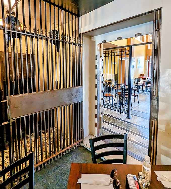 The actual bank vault behind iron gates, now guarding recipes instead of cash, which is arguably more valuable.