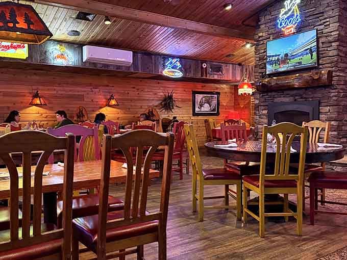 Dining tables sit ready beneath wood ceilings and Western art, creating atmosphere that money can't buy artificially.