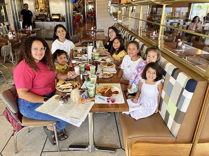 Multiple generations gathered around one table sharing laughter and pancakes, this is what Sunday mornings were absolutely meant to be.