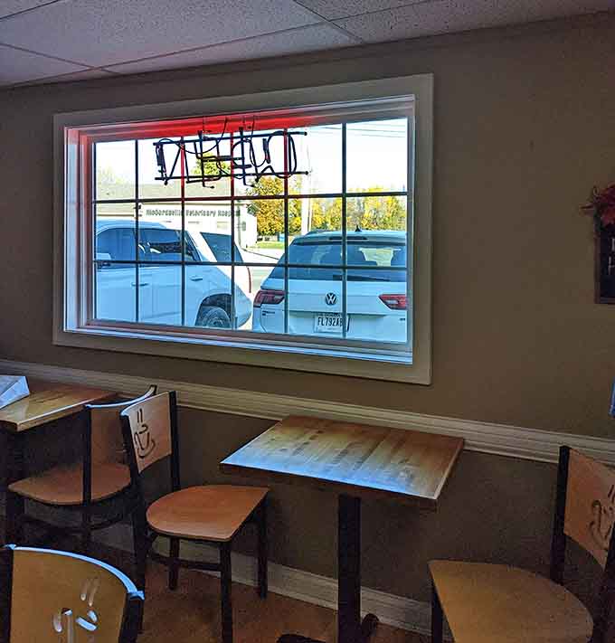 Window seats for watching the world go by while your donut disappears faster than you planned.