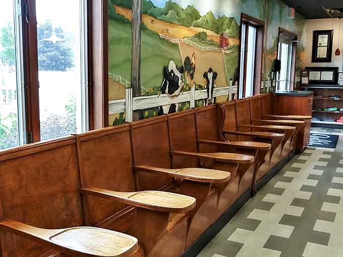 Wooden booth seating offers a cozy spot to tackle your cone before it melts into a sticky situation.