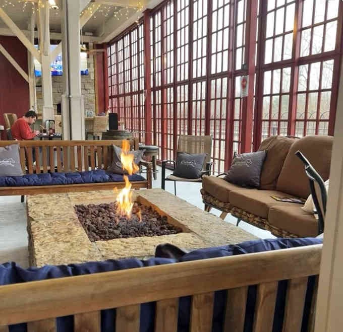 A fire table and comfortable seating make this lounge the perfect spot to linger over good conversation.