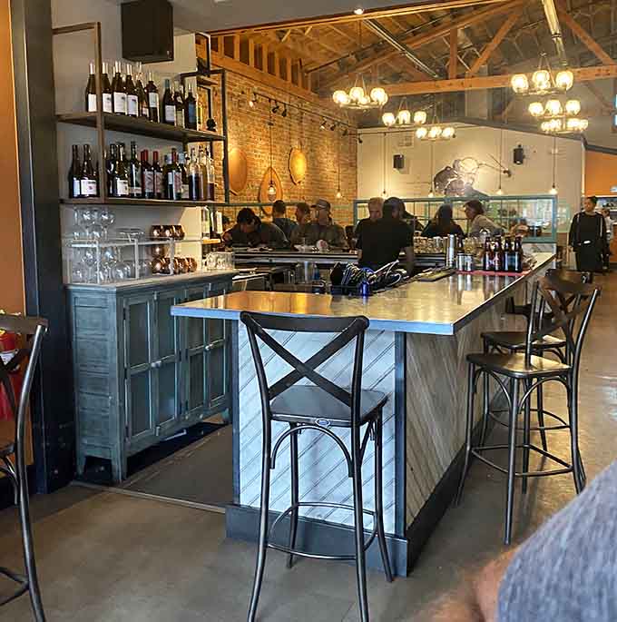 The bar area gleams with possibilities, from craft cocktails to local brews, all served with genuine mountain hospitality.