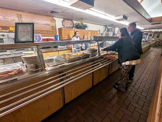 Customers navigate the cafeteria line where every choice leads to deliciousness and the only wrong answer is skipping dessert entirely.