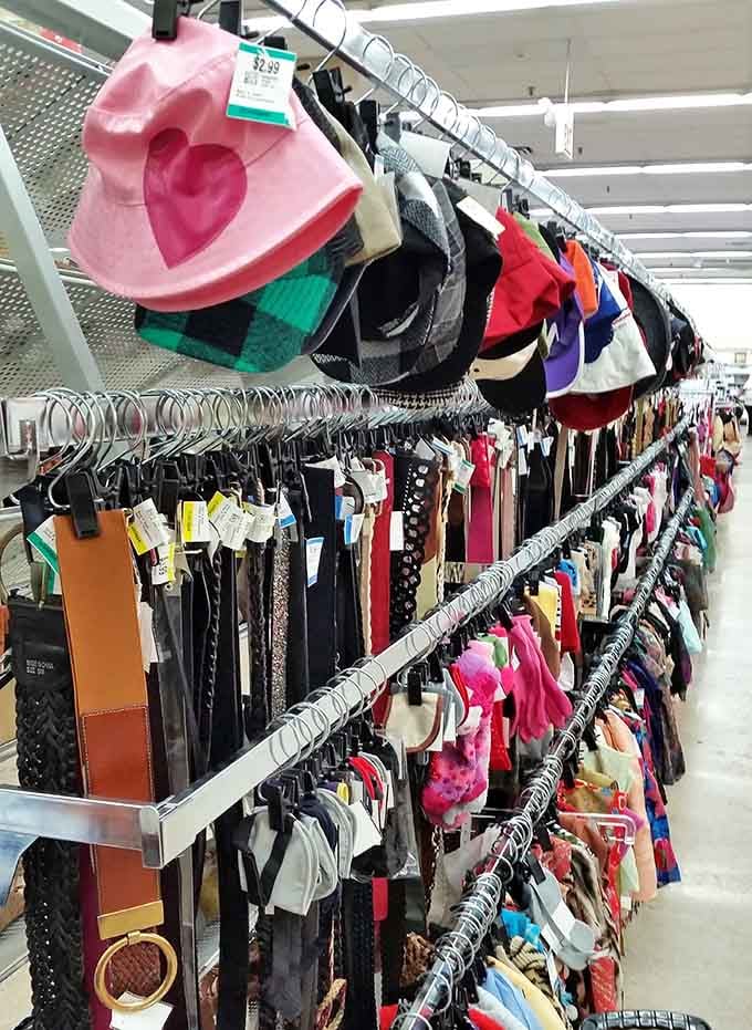 Belts and hats displayed like a fashion buffet, offering accessories to complete any outfit you can imagine.