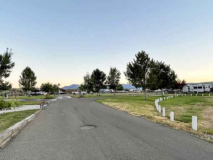 Tree-lined campground roads invite evening strolls where your biggest decision is which sunset spot to claim tonight.