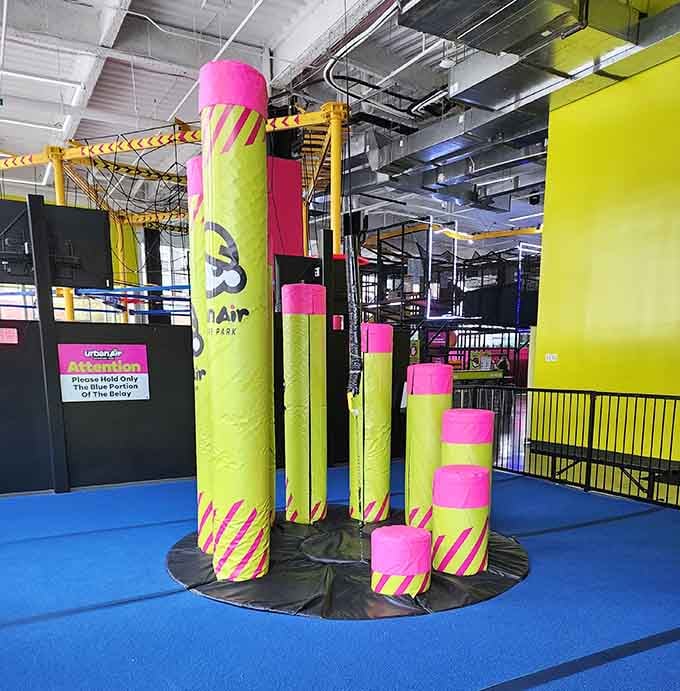 The Drop Zone towers above like a neon monument to the question: "How brave are you feeling today, exactly?"